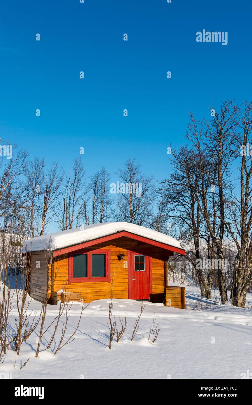 A cabin in the snow near Bjorkliden in Swedish Lapland; northern Sweden ...