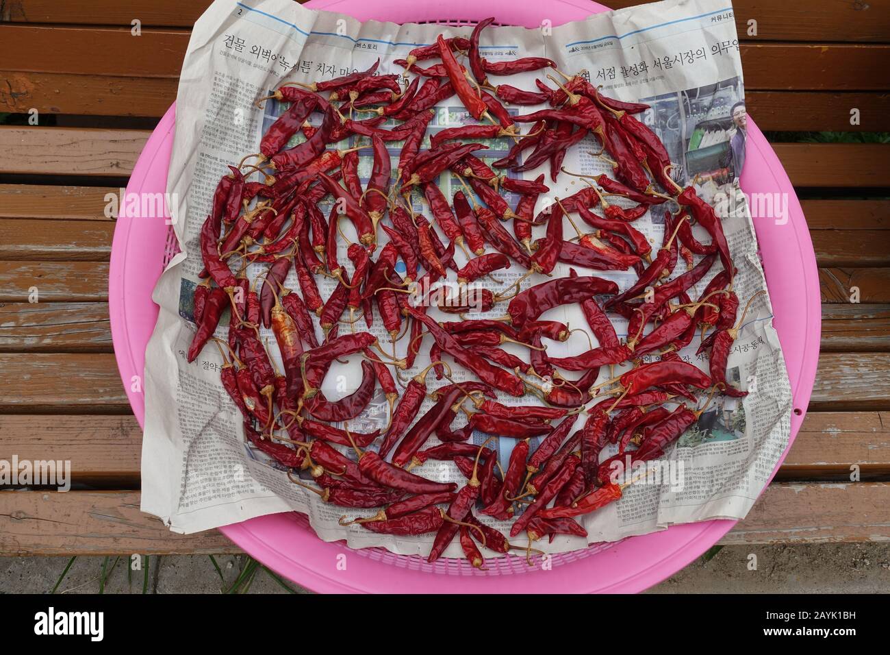 Chillies drying in the sun hi-res stock photography and images - Alamy