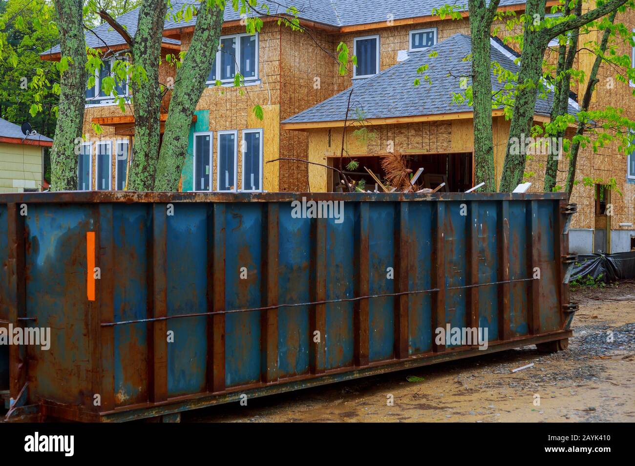 Construction trash dumpsters on metal container, house renovation Stock ...
