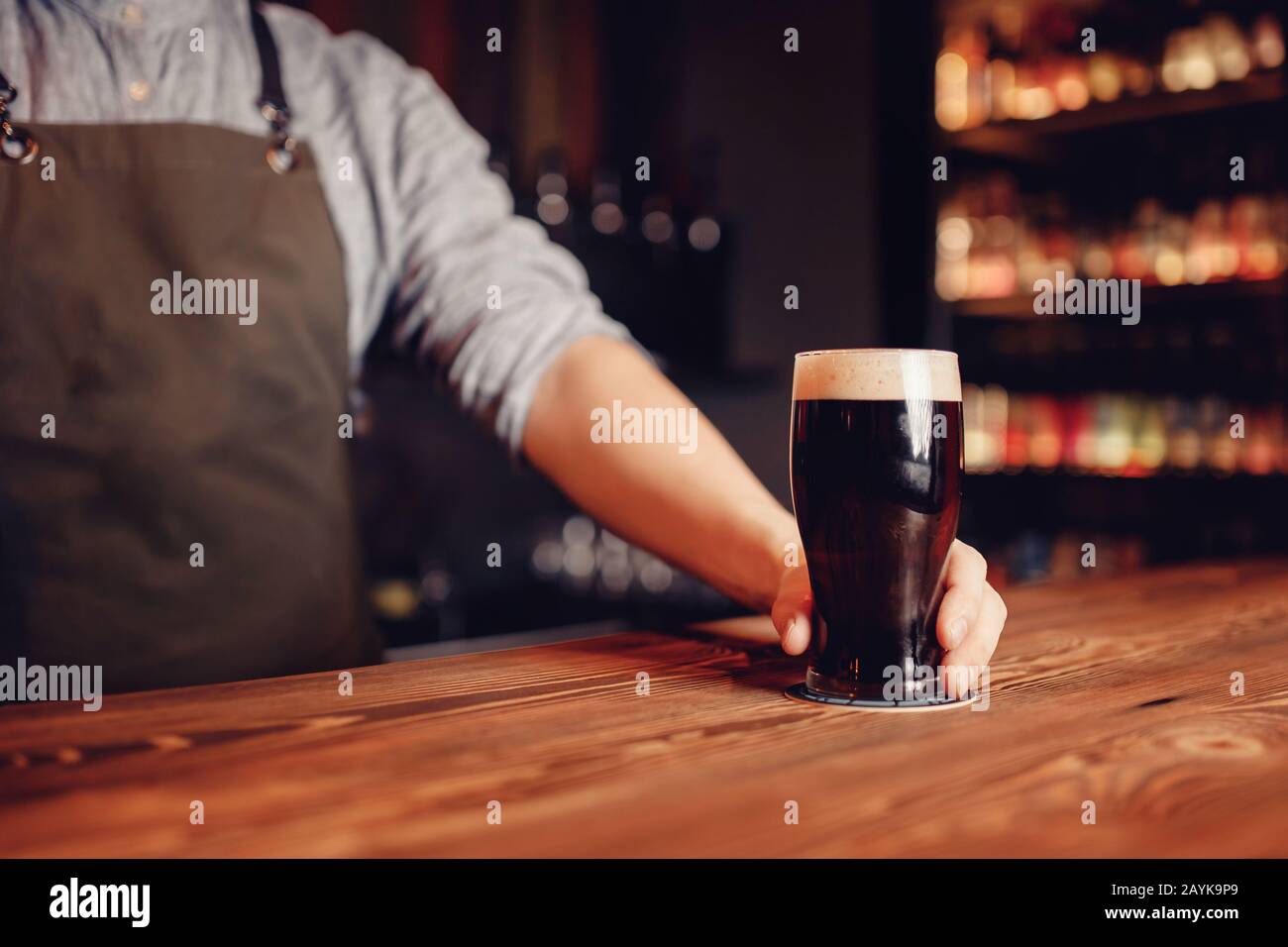 Bartender bottle behind bar hi-res stock photography and images - Alamy