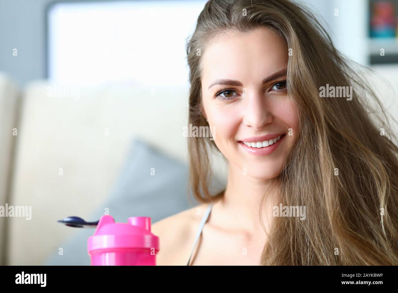 Girl drinks water from bottle prevent dehydration Stock Photo - Alamy