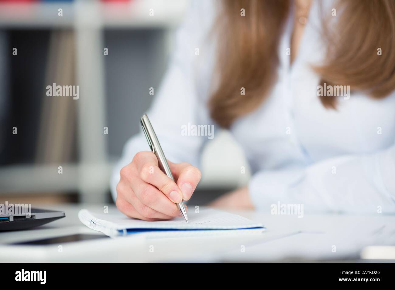 Business concept: signing contracts, notes in a notebook, scheduling ...