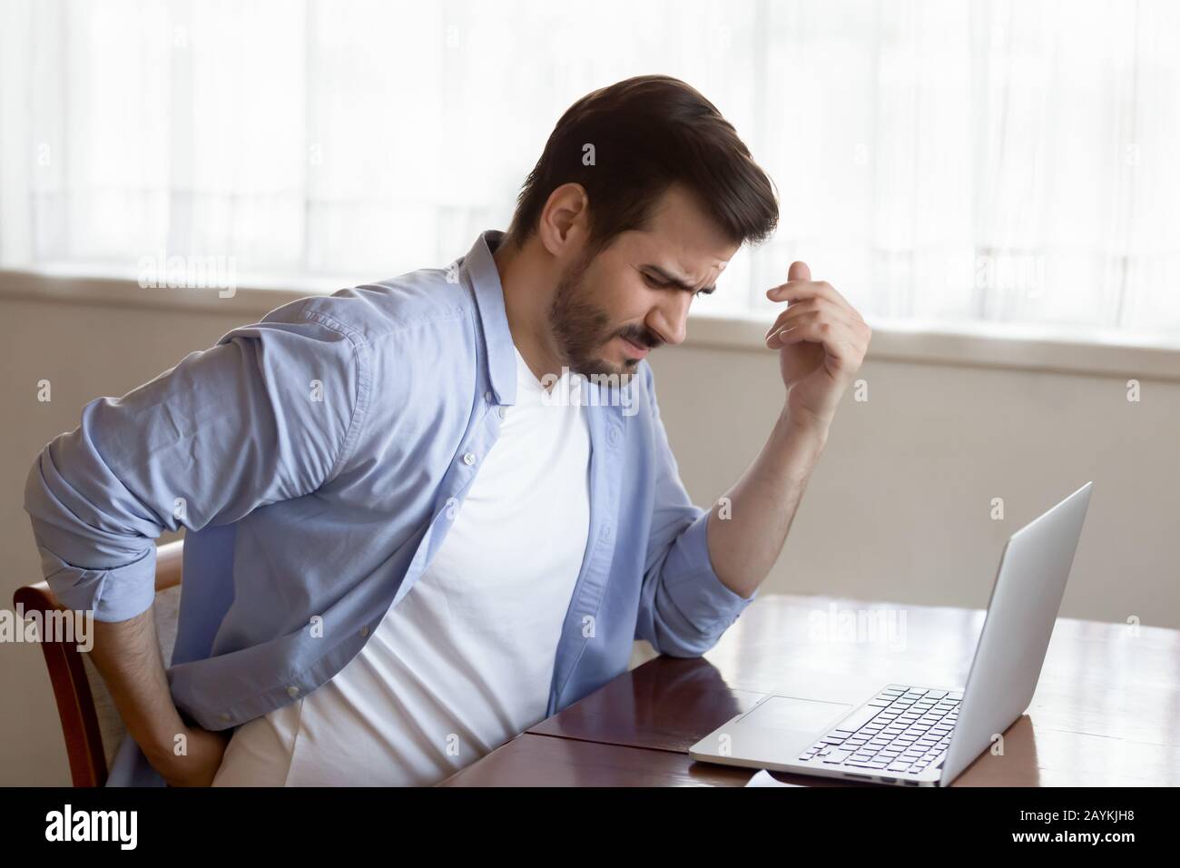 Sick young caucasian man working hi-res stock photography and images ...