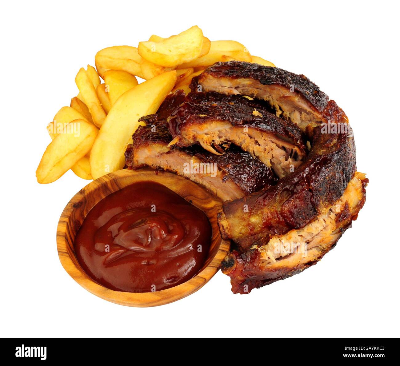 Barbecued pork ribs meal with chips and barbecue sauce dip isolated on ...