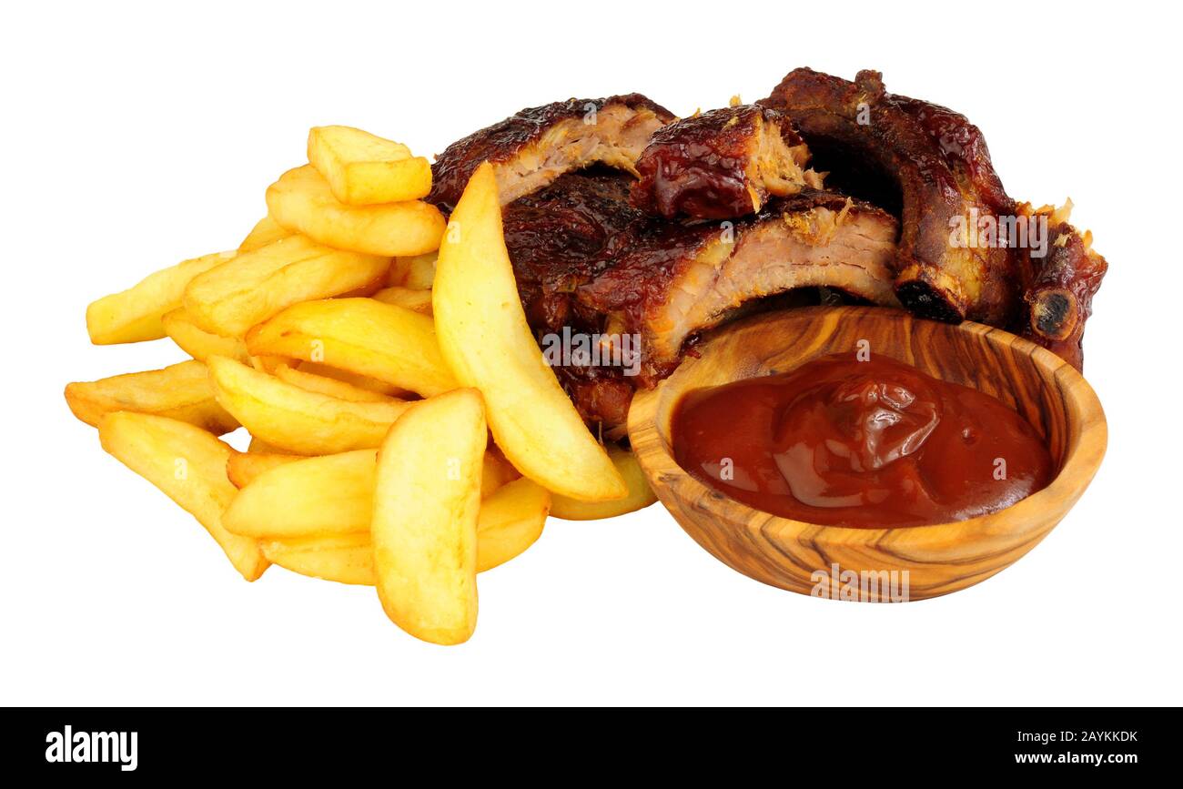 Barbecued pork ribs meal with chips and barbecue sauce dip isolated on ...