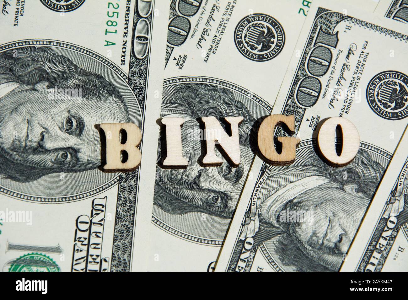 The inscription bingo on the 100 dollar bills background. 100 dollar ...