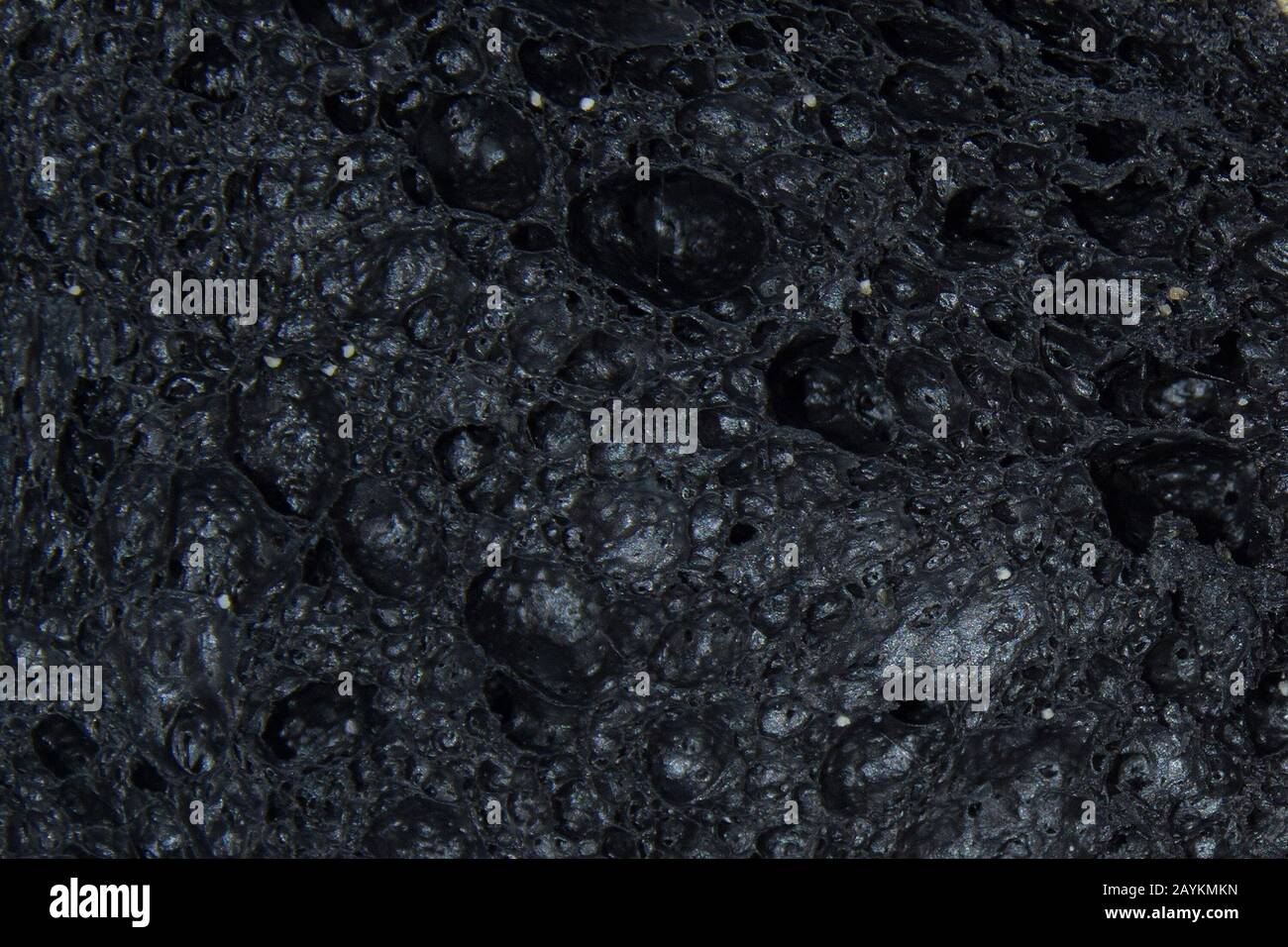 Black Porous Texture or background. Soft selective focus Stock Photo ...