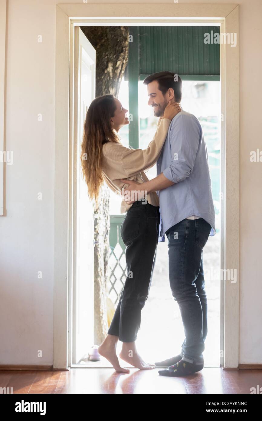 Happy married couple excited to move in together Stock Photo - Alamy