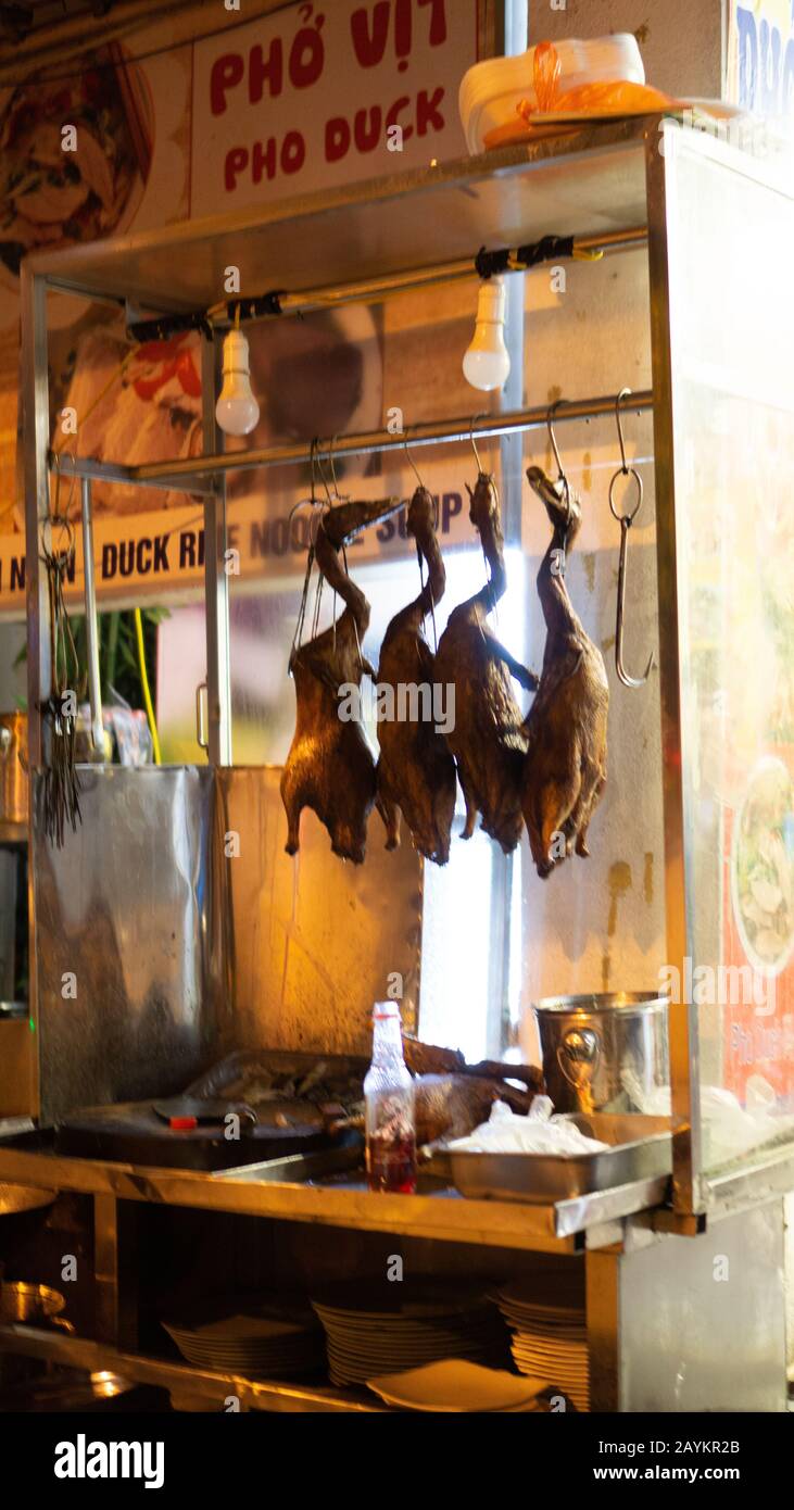 Hanging roast ducks hi-res stock photography and images - Alamy