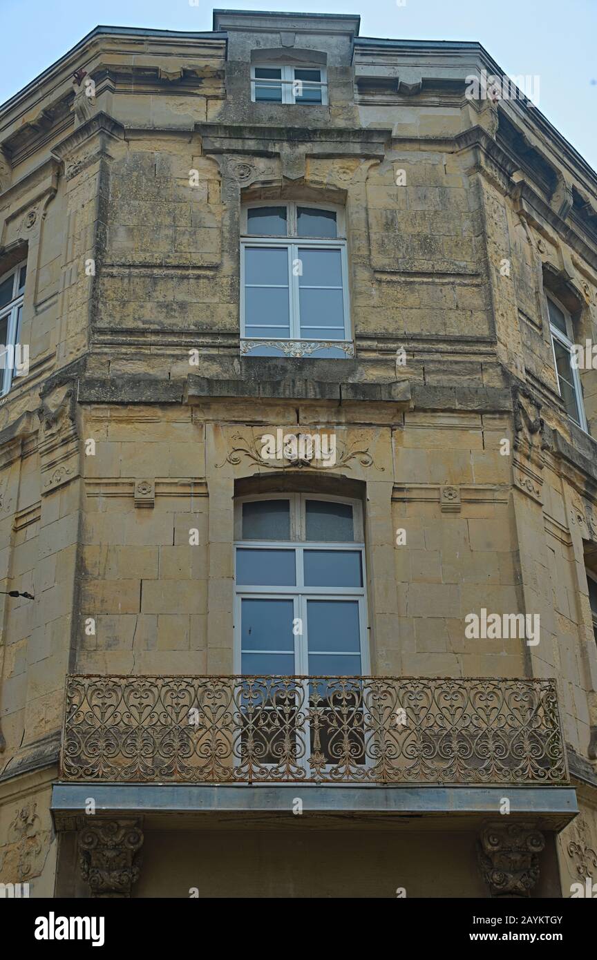 Old traditional French stone corner building with wooden windows Stock ...