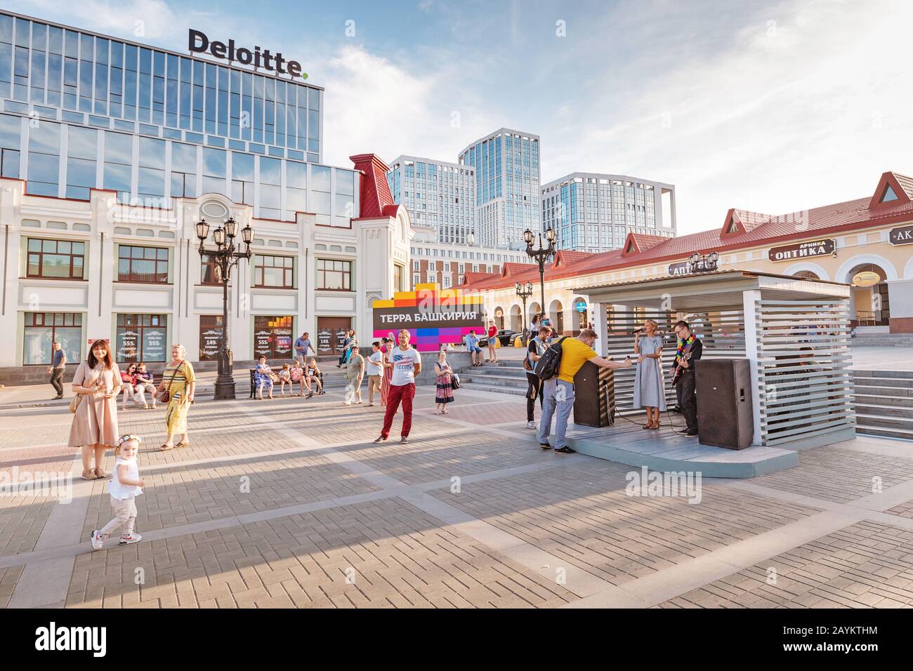 22 JUNE 2019, UFA, RUSSIA: People relaxing on a city square with Street ...