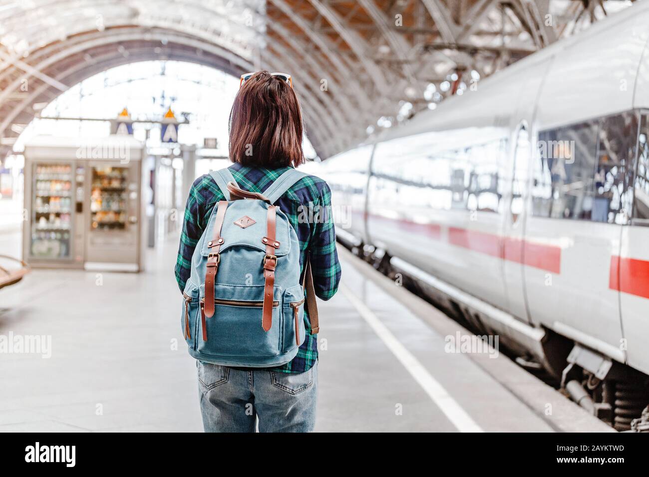 Girl on train station backpack hi-res stock photography and images - Alamy