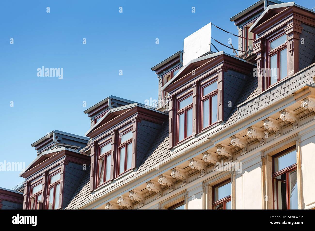 Attic windows on roof of the building Stock Photo - Alamy