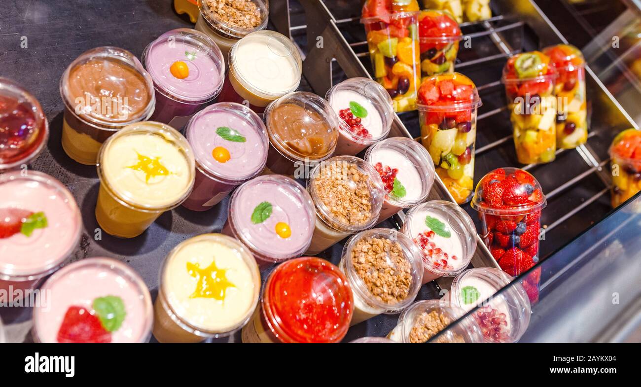 assortment of yogurt on display for sale at convenience store Stock ...