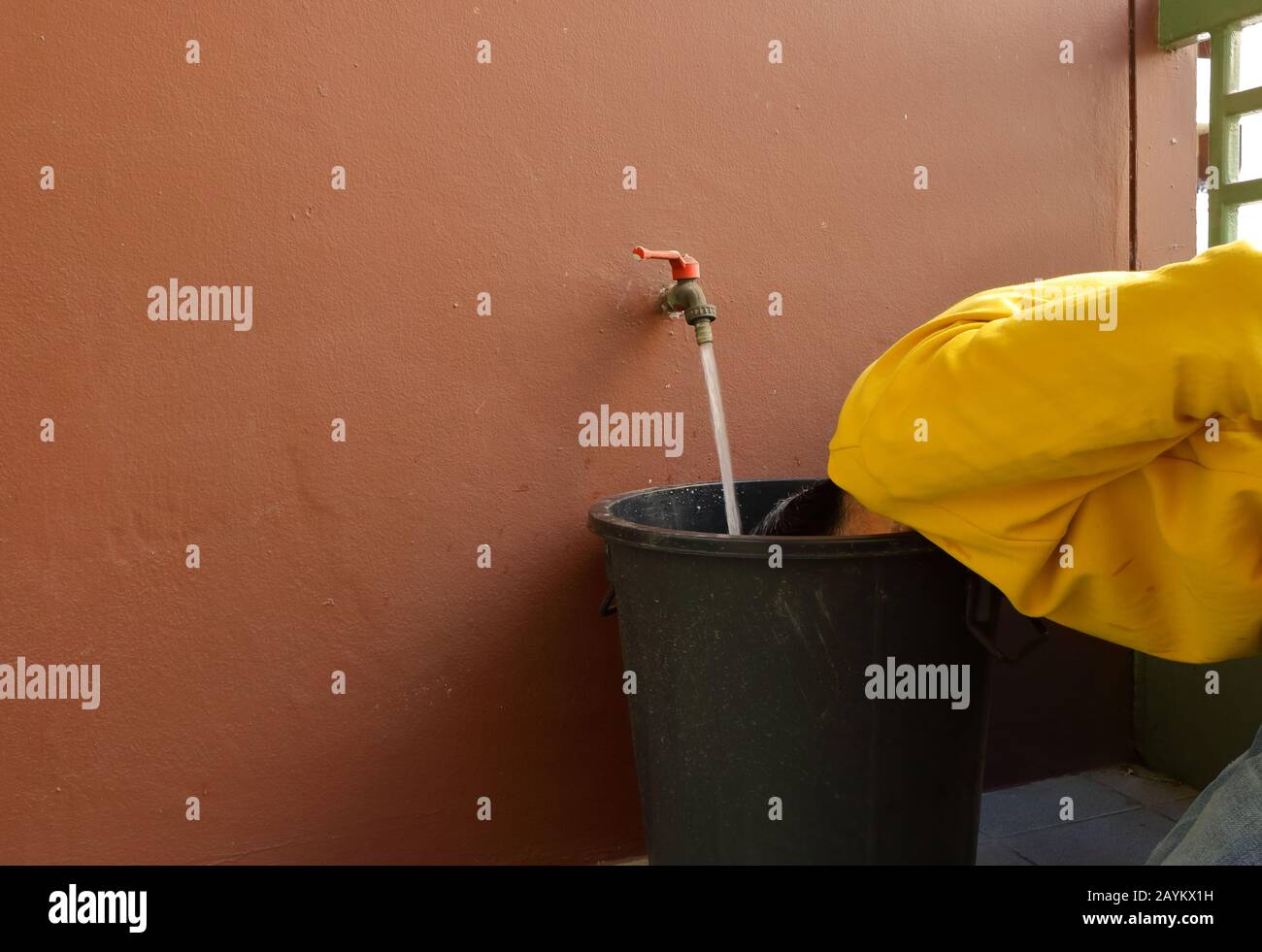 Water flowing from a bucket hi-res stock photography and images - Alamy