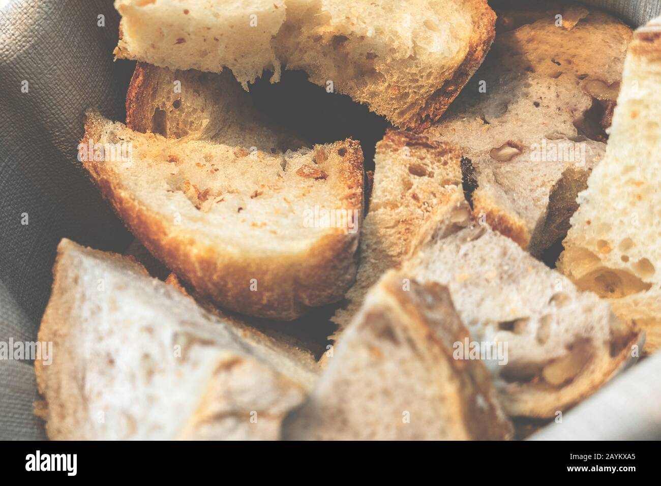 Vintage photo of a bread basket. Traditional fresh tasty bread in a ...