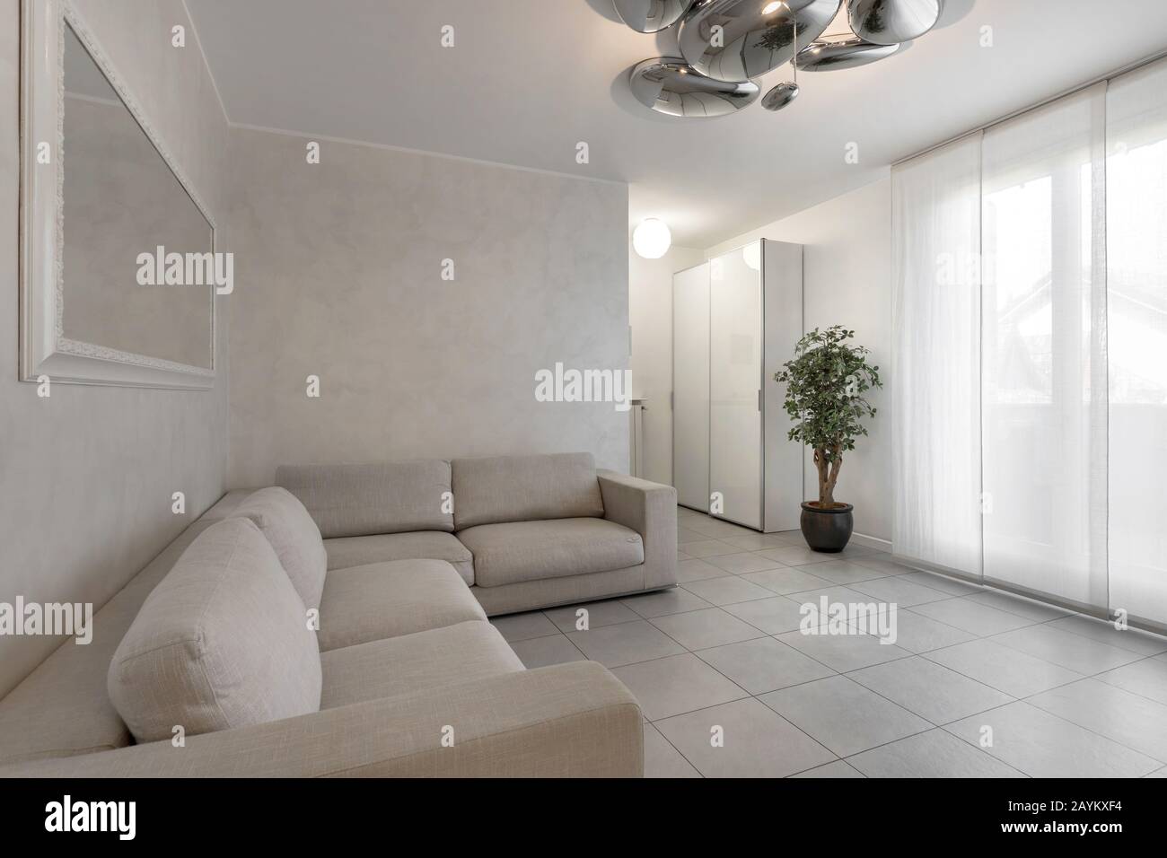 Italian interior design. Stylish living room in white color with sofa ...