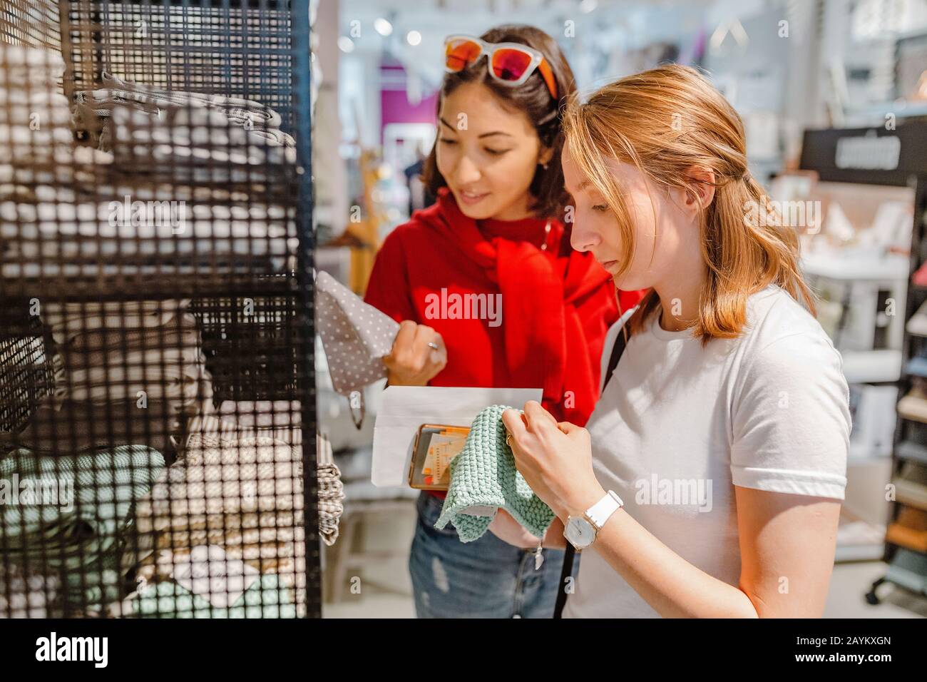 Women choose fabric textile Stock Photo - Alamy
