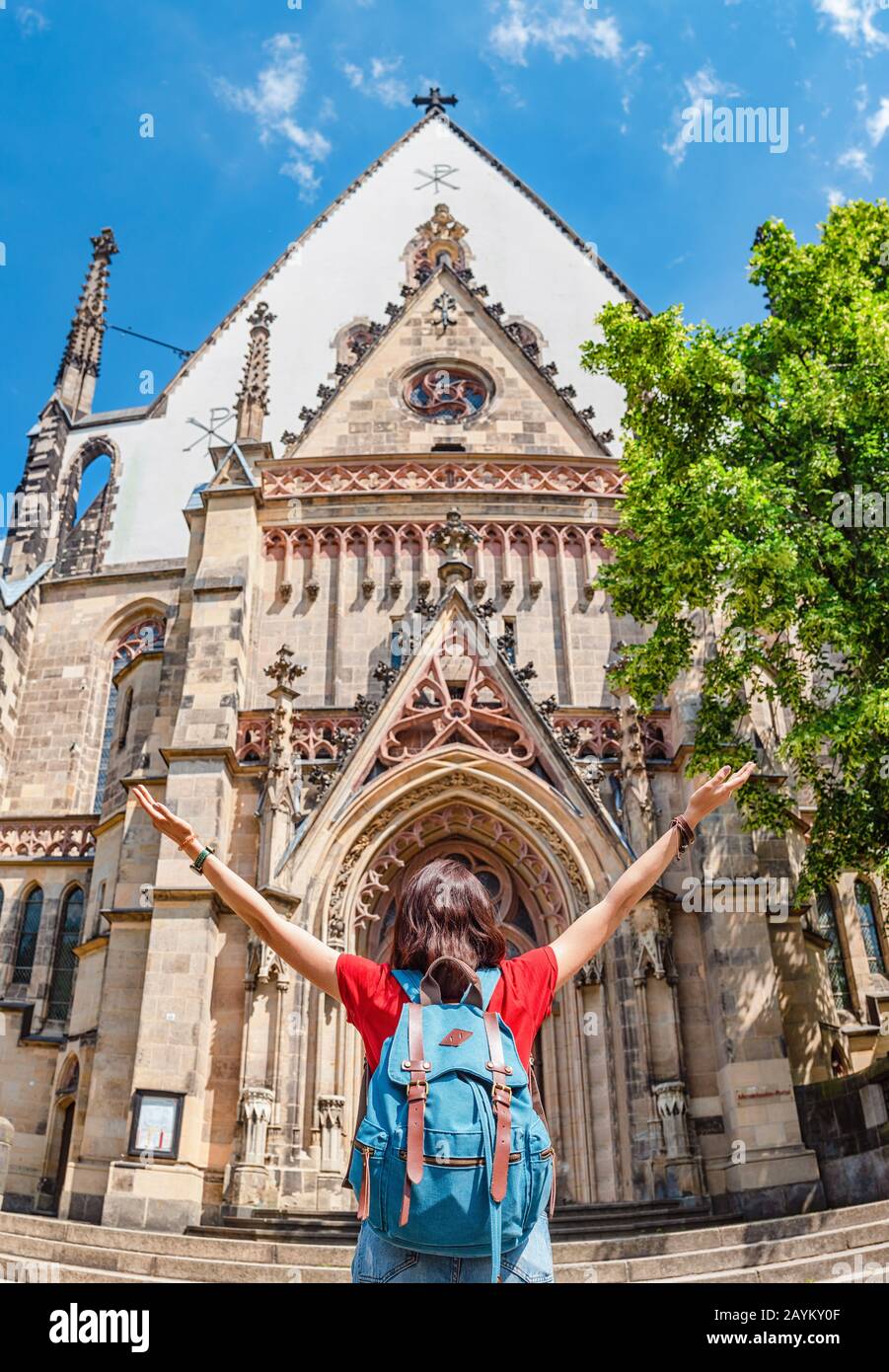 Happy Woman tourist admires Panoramic view of Architecture and Facade ...