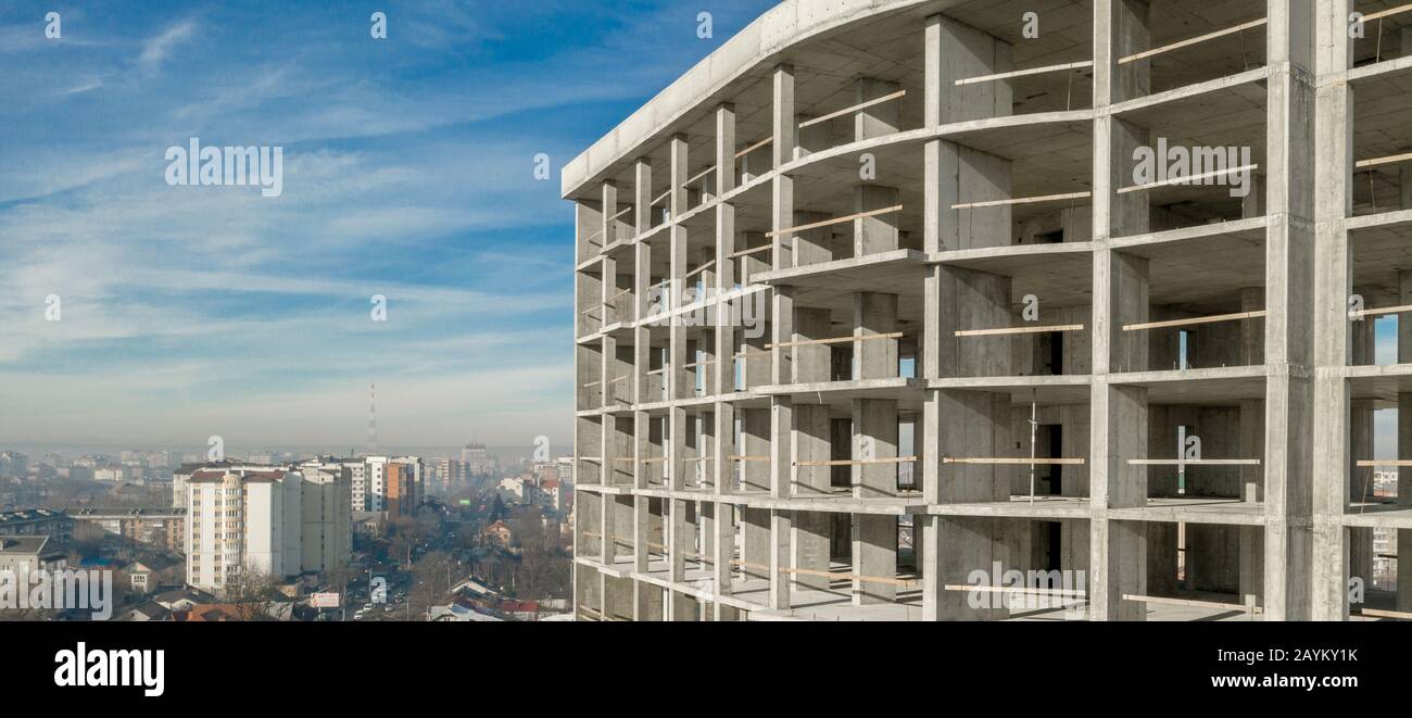 Panorama of Aerial view of concrete frame of tall apartment building ...