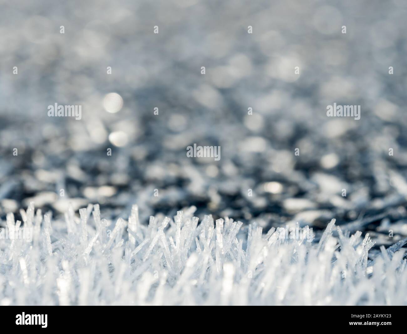 Bed of ice crystals with blurry icy surface in the background Stock ...