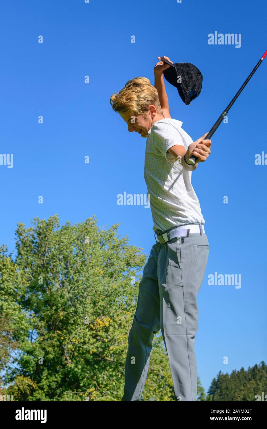 Emotional young golf player gets angry after bad drive Stock Photo - Alamy