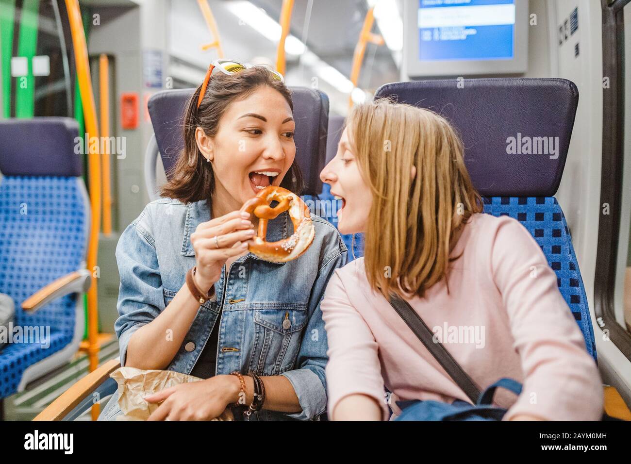 Train passengers eating hi-res stock photography and images - Alamy