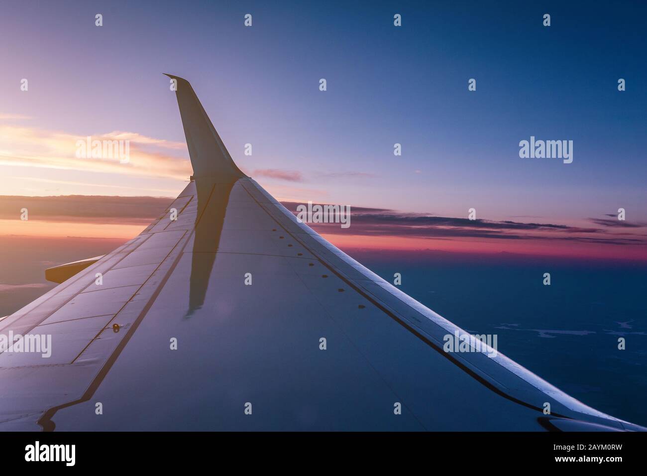 Evening dusk and sunset view with Wing of an airplane Stock Photo - Alamy