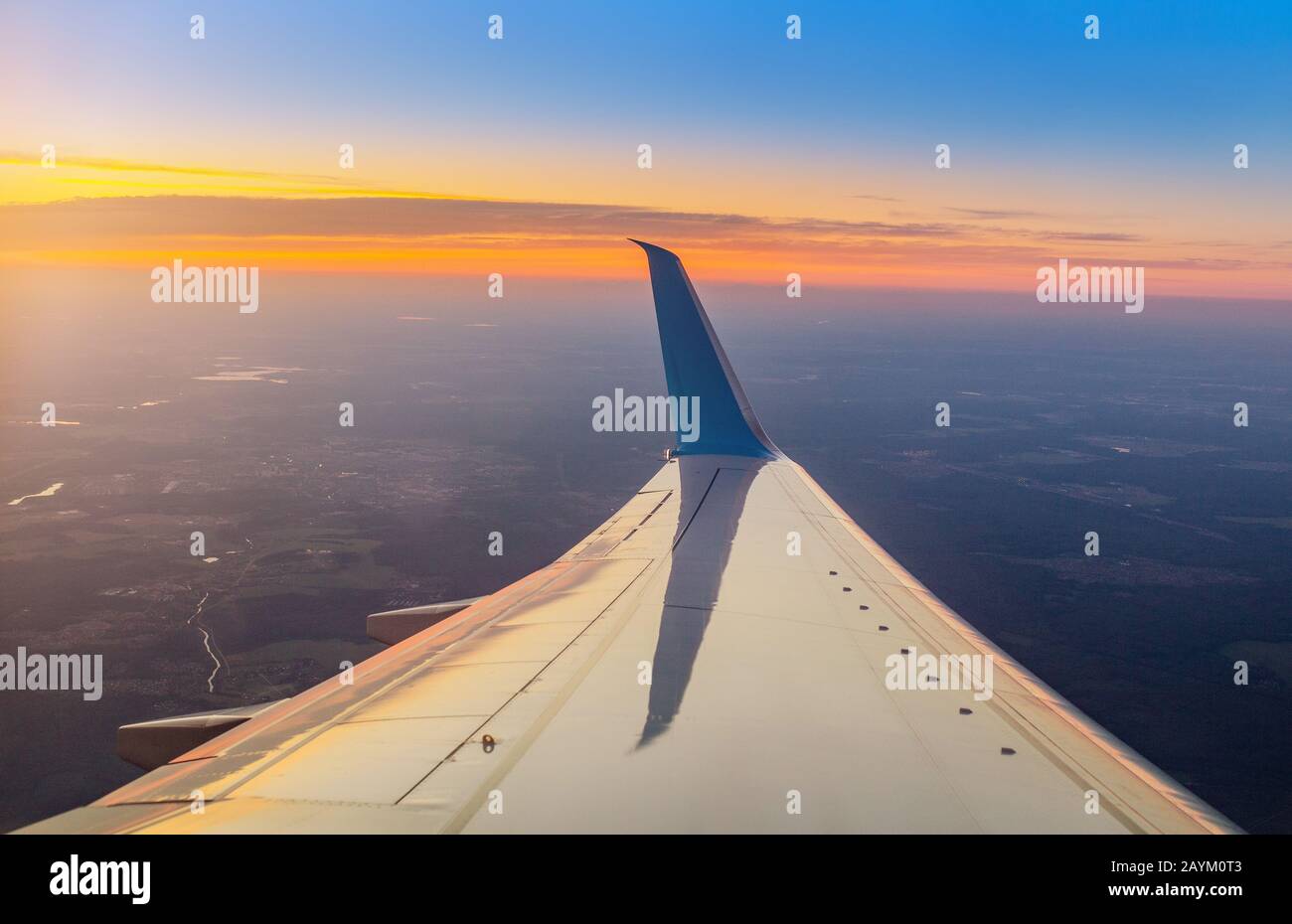 Evening dusk and sunset view with Wing of an airplane Stock Photo - Alamy