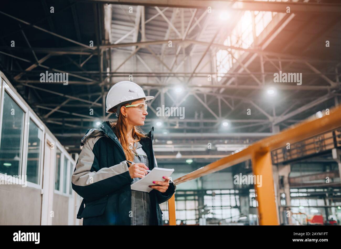 Female engineer in white safety hi-res stock photography and images - Alamy