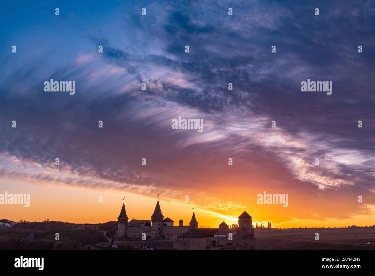 medieval castle or stronghold silhouette and beautiful sunset. Tourism ...