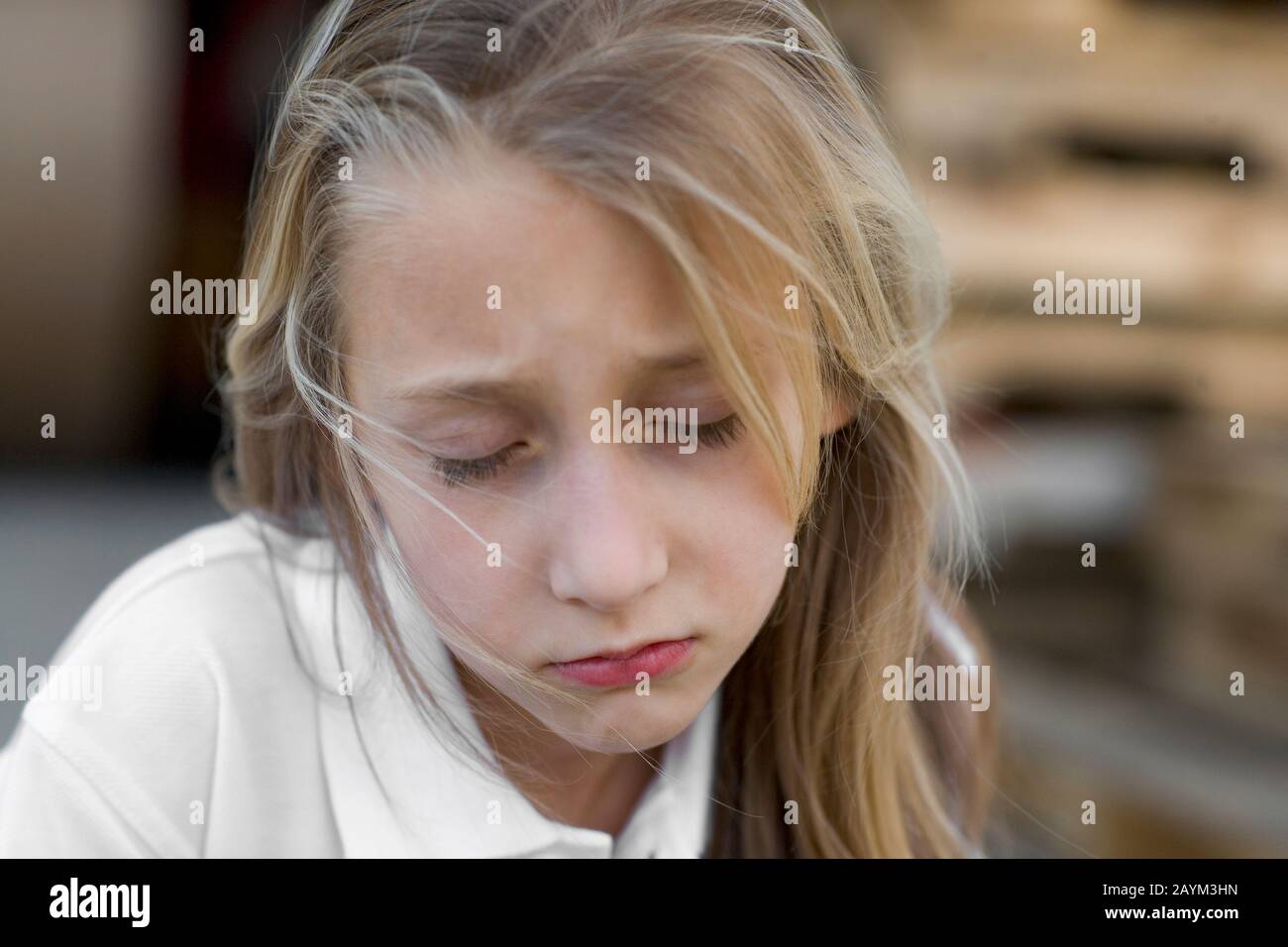 Girl Looking Down Crying