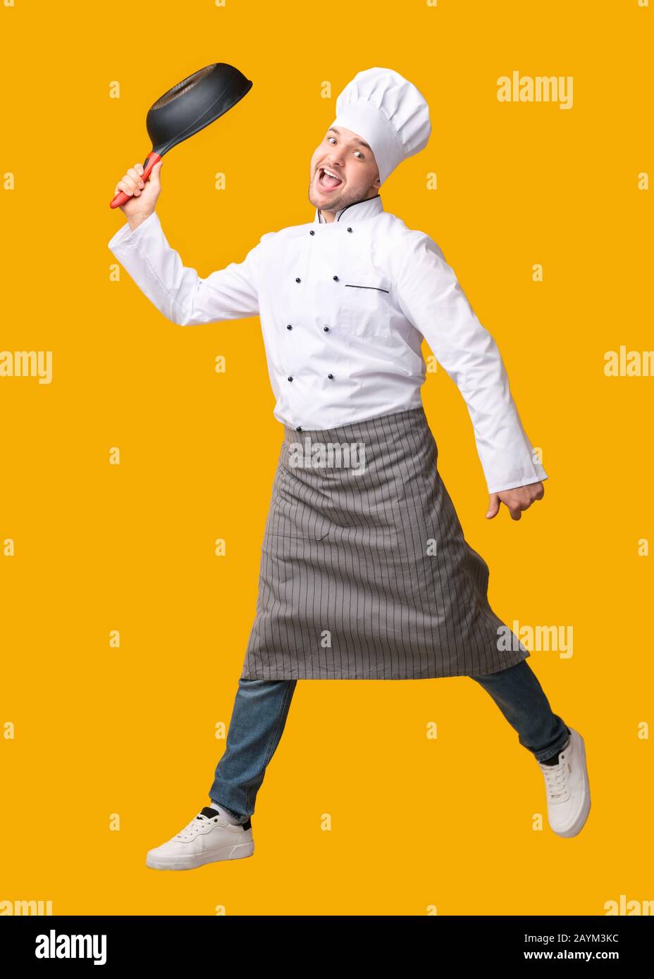 Funny Chef Jumping Posing With Frying Pan Over Yellow Background Stock ...