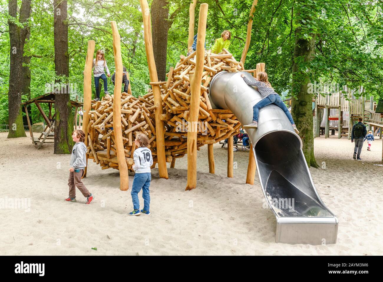 18 MAY 2018, BERLIN, GERMANY: happy children enjoying slides on new ...