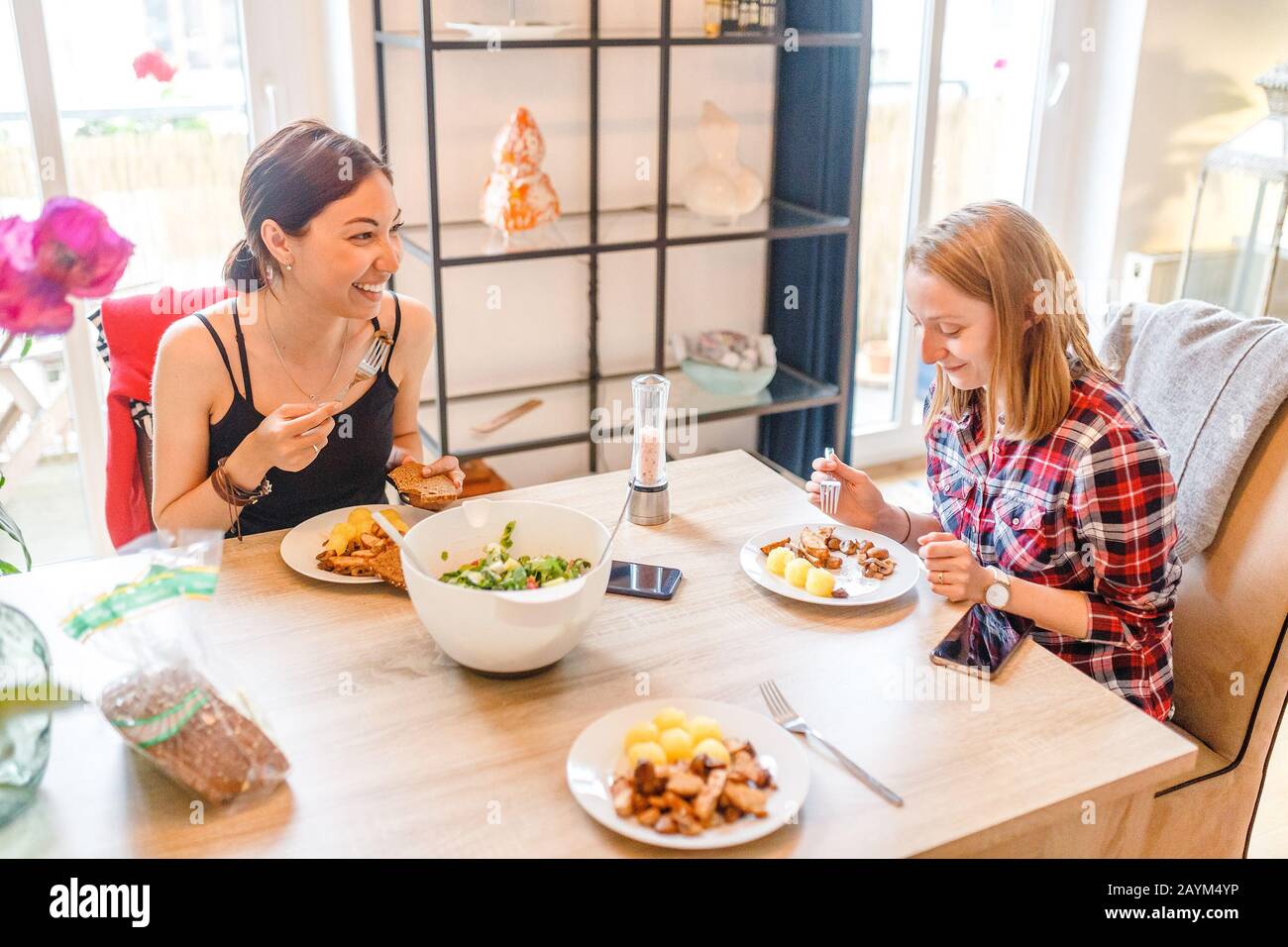 Two Friends Eating Dinner
