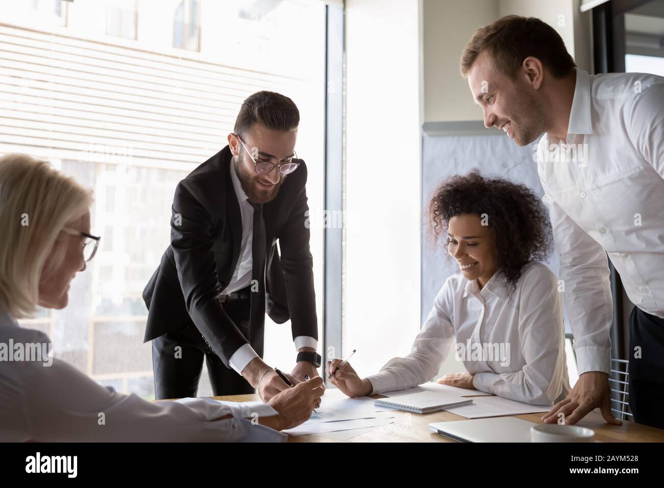 Arab ceo and diverse corporate partners managing company finances Stock ...