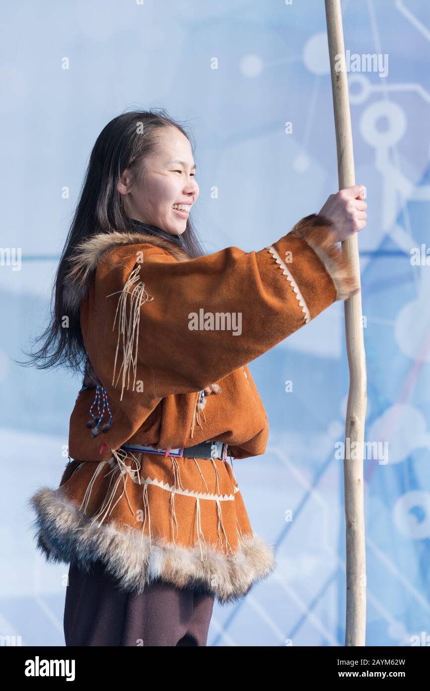 Aboriginal female emotion dancing with spear in national clothes ...