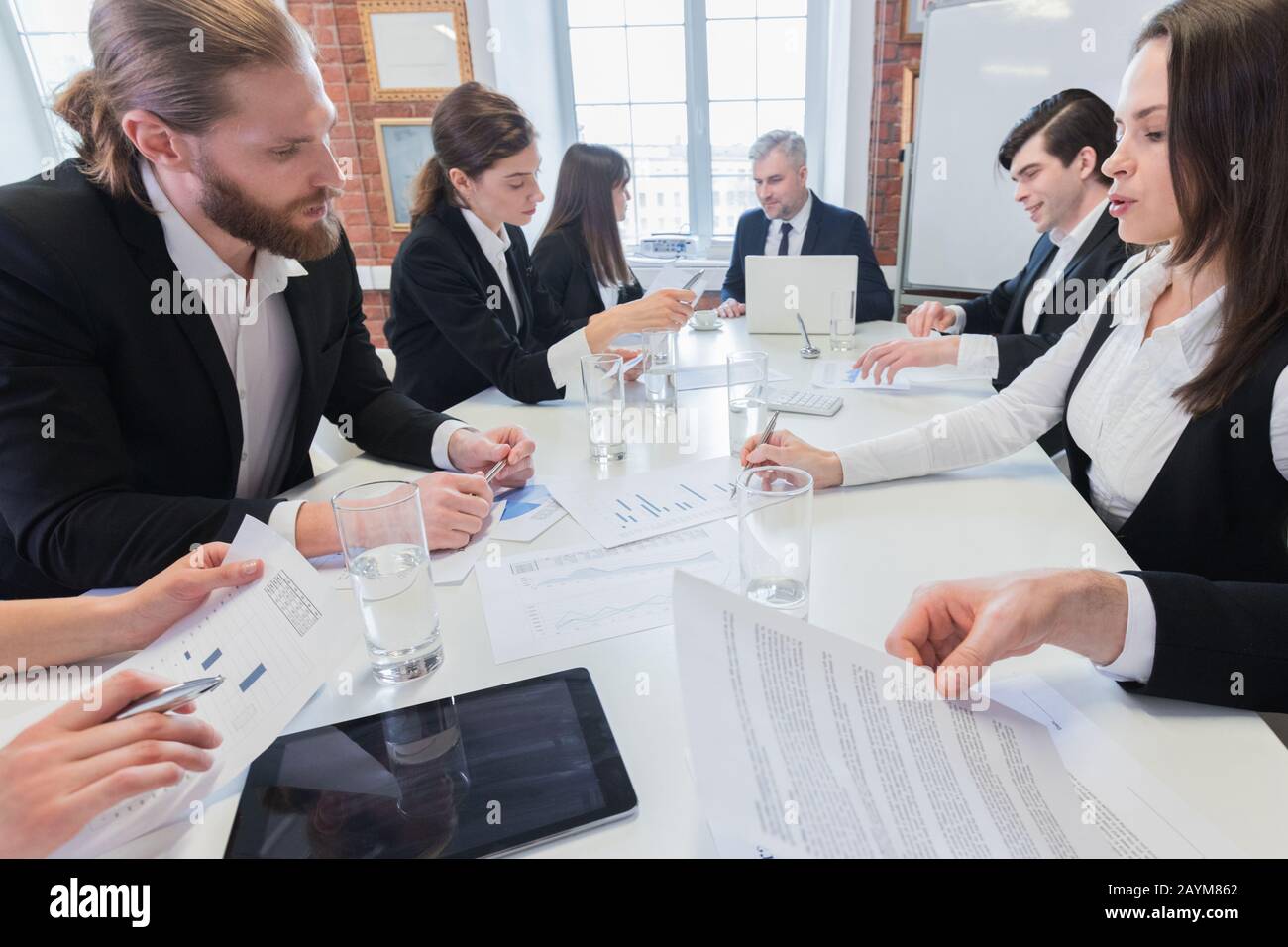 Group of many business people working together in office with financial ...