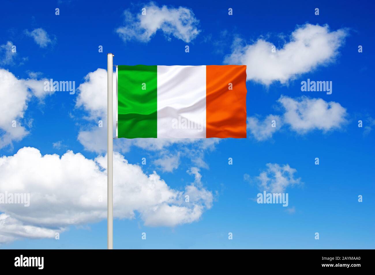 flag of Ireland in front of blue cloudy sky, Ireland Stock Photo - Alamy