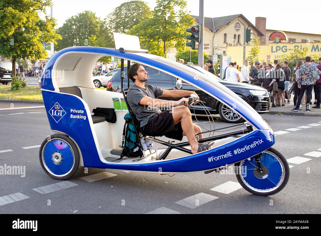 BERLIN, GERMANY - 20 MAY 2018: Rickshaw bicycle taxi at city street ...