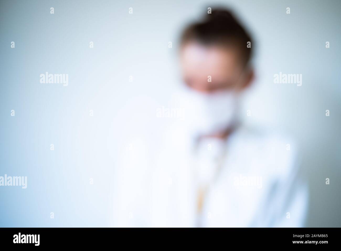blurred image of a doctor wearing mask Stock Photo - Alamy