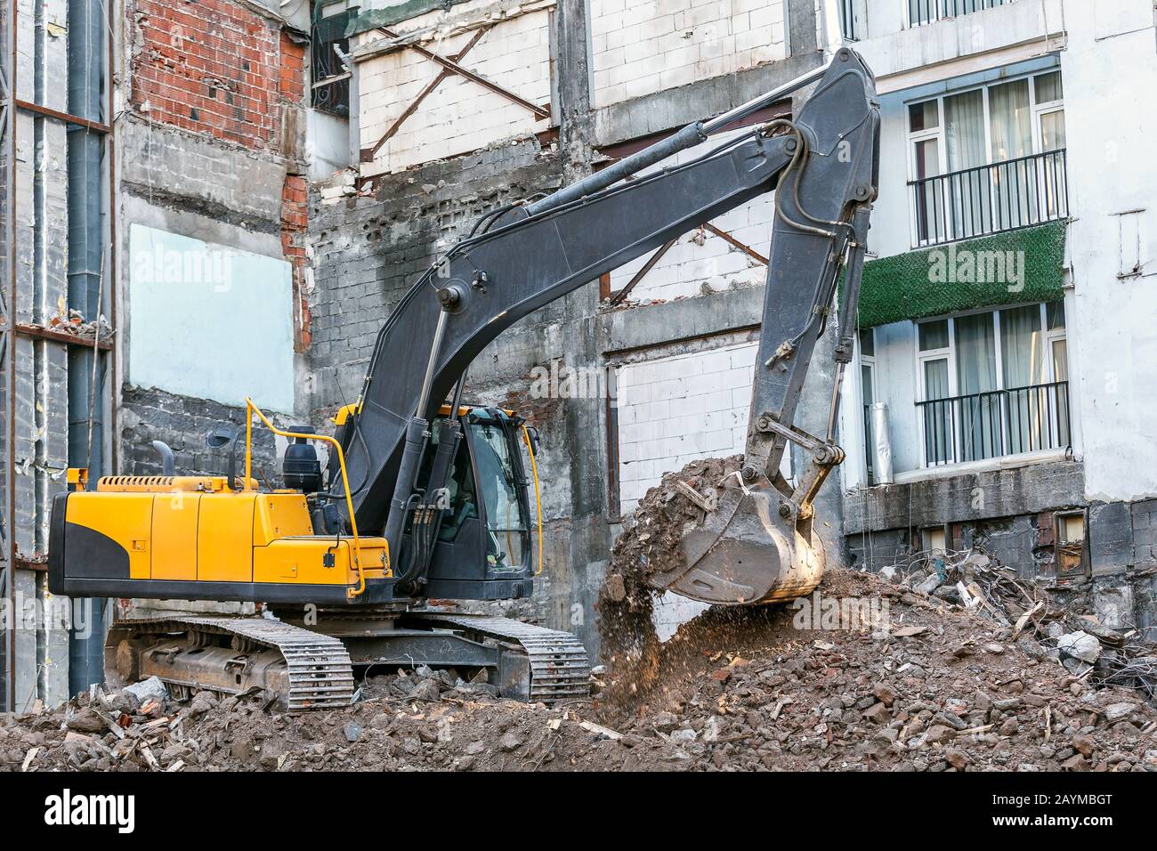 Building demolition with excavator. to renovate the building Stock ...