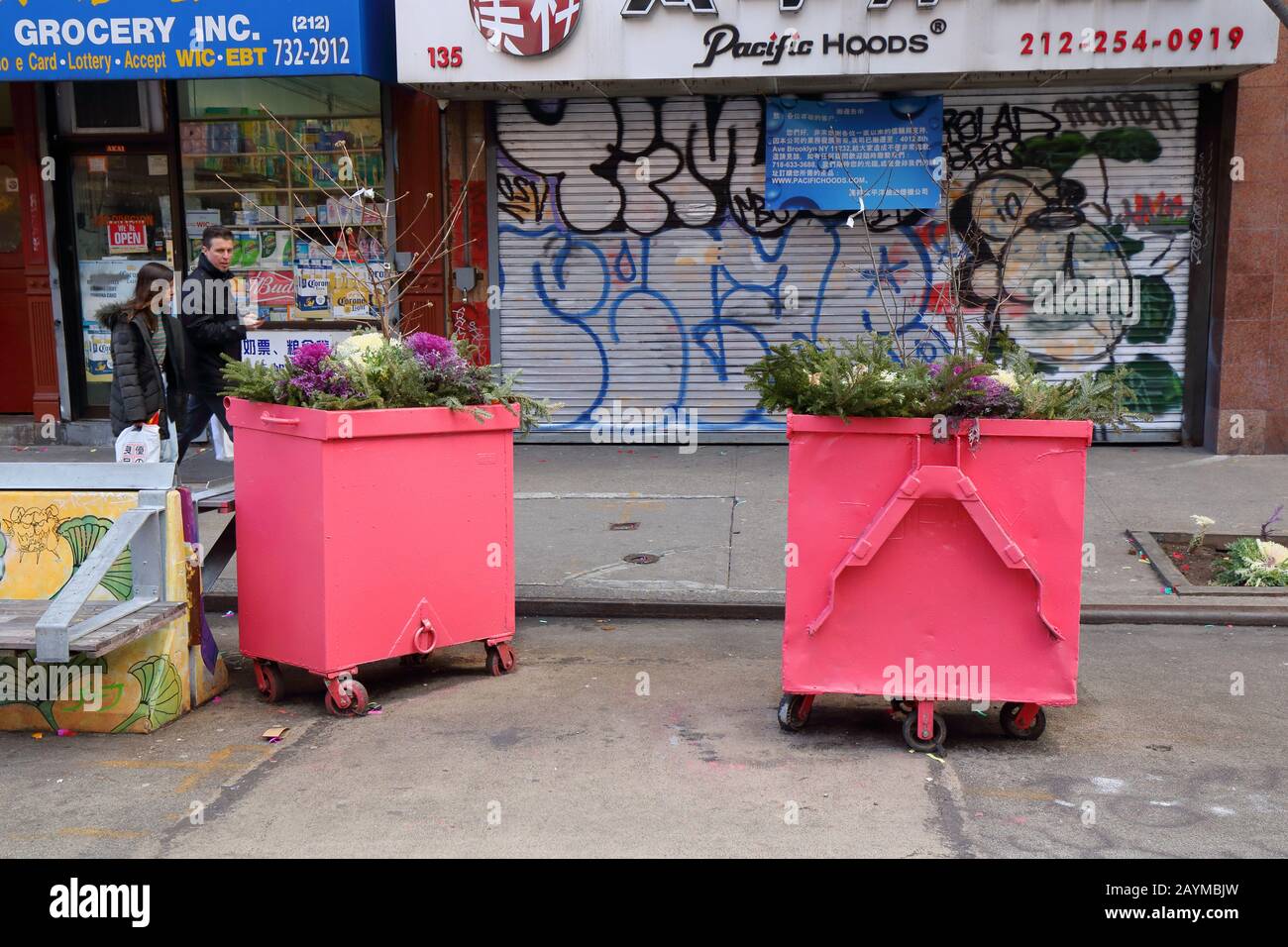 Commercial dumpsters repurposed as flower plants with decorative ...
