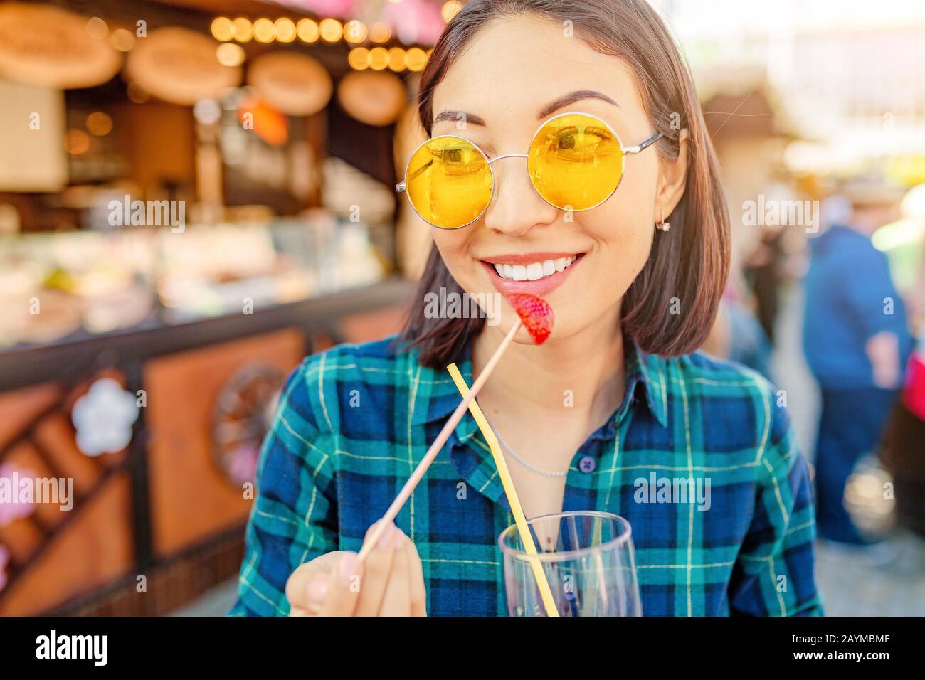 Cheerful Woman Enjoying European Fair Market and festival Stock Photo ...