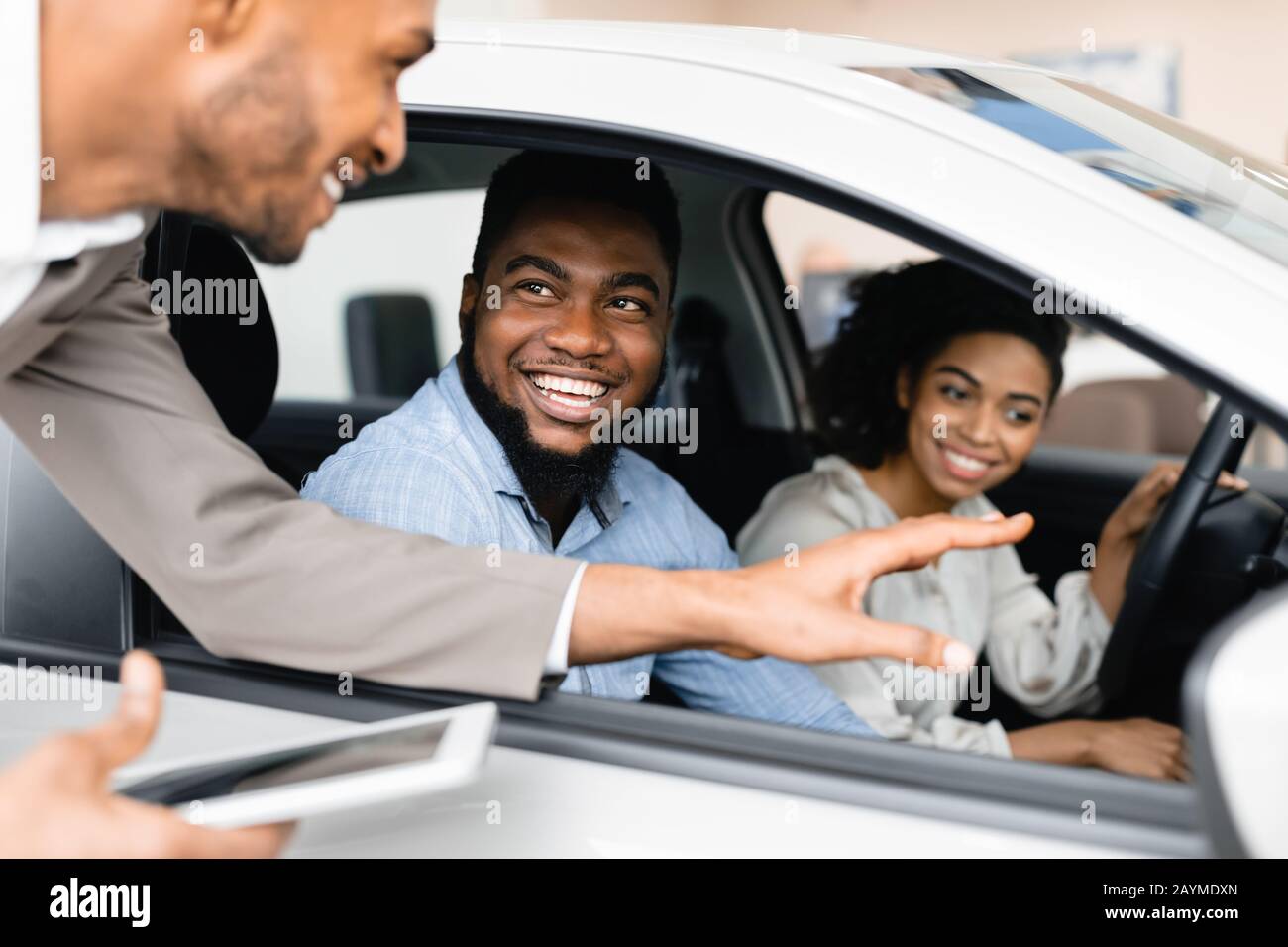 Salesman talking family in hi-res stock photography and images - Alamy