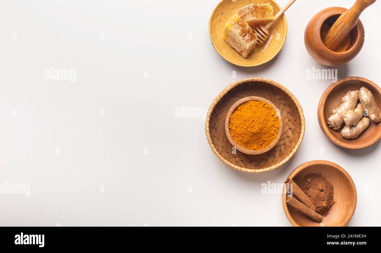 Raw organic orange turmeric root and powder on white Stock Photo - Alamy