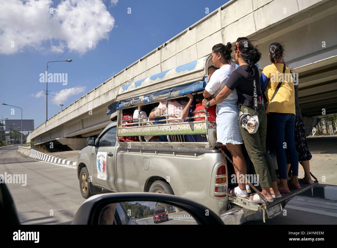 Vehicle overloaded people hi-res stock photography and images - Alamy