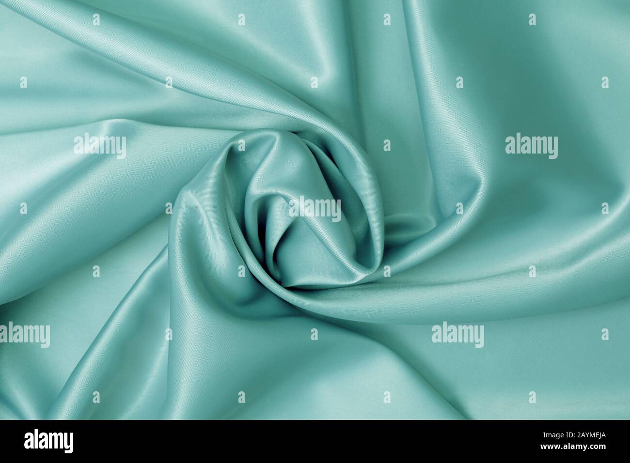 Trendy mint color background from silk draped fabric Stock Photo - Alamy