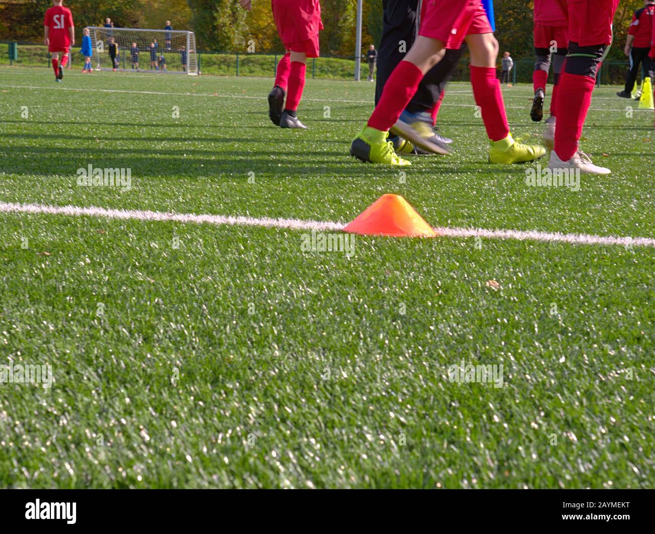 Professional sportsperson practicing football grass hi-res stock ...