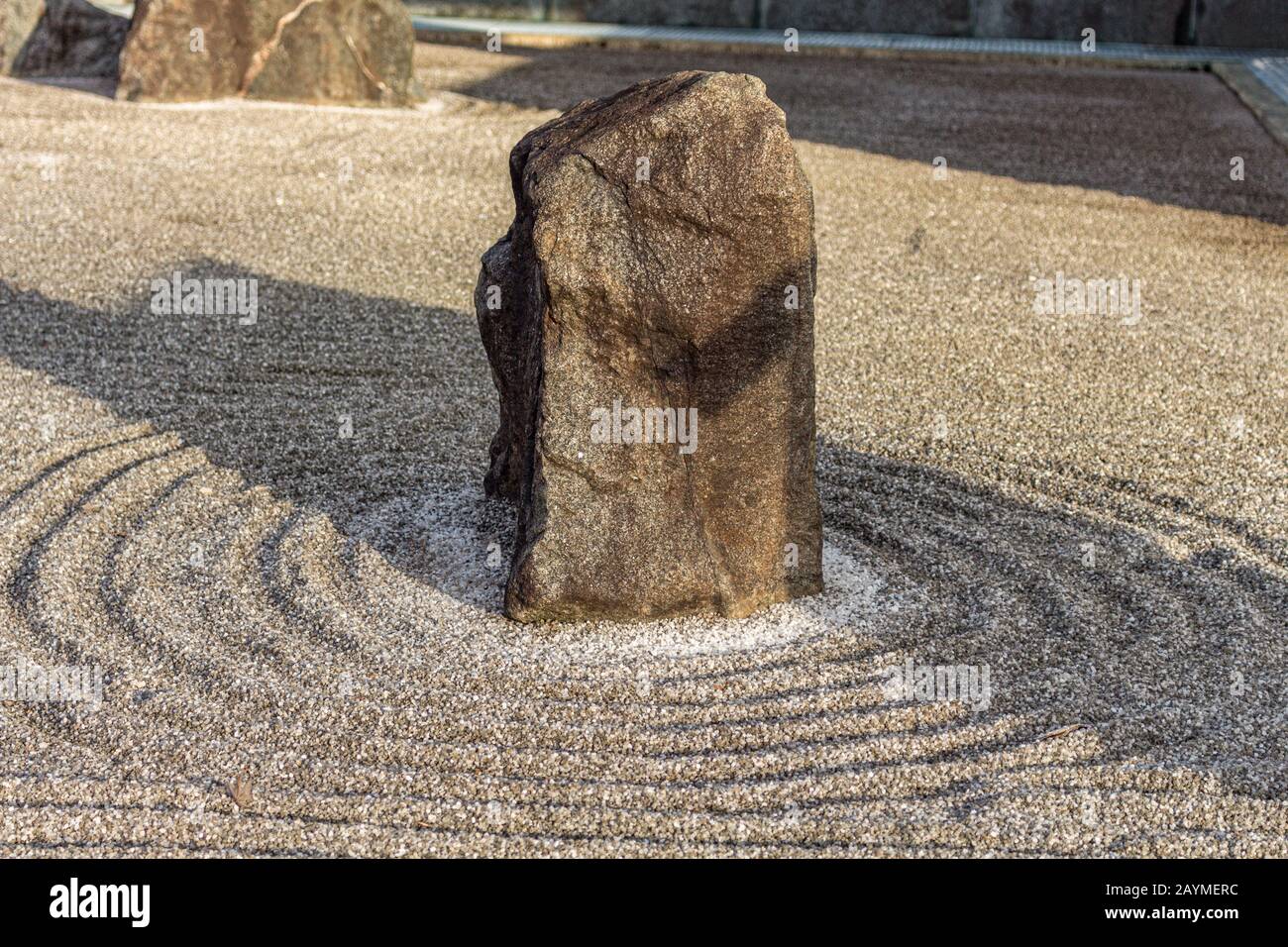 Japanese dry rock zen landscape garden, or karesansui, with raked sand ...
